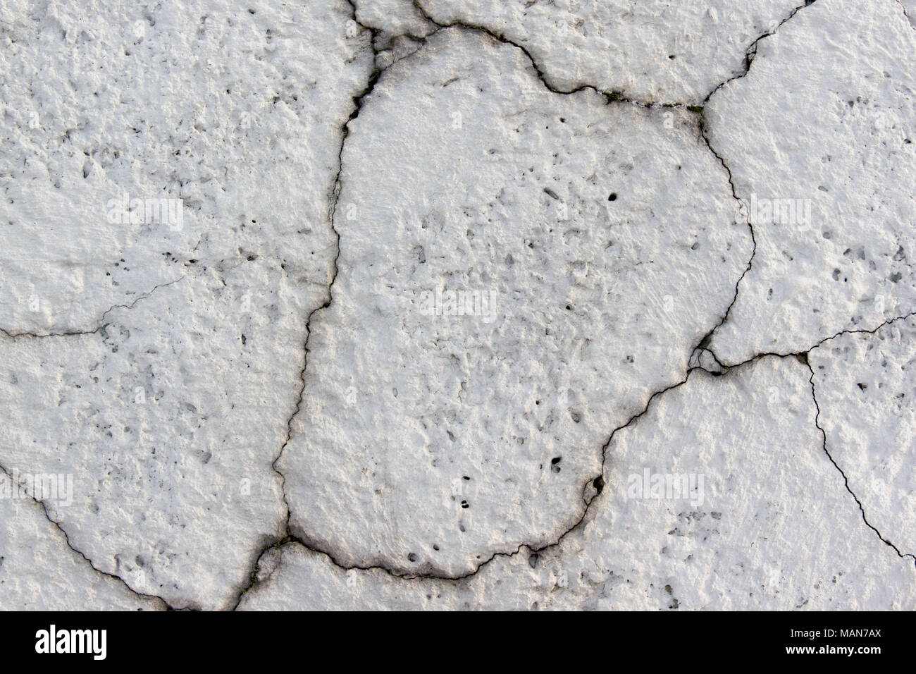 Concrete grey wall with cracks closeup Stock Photo - Alamy