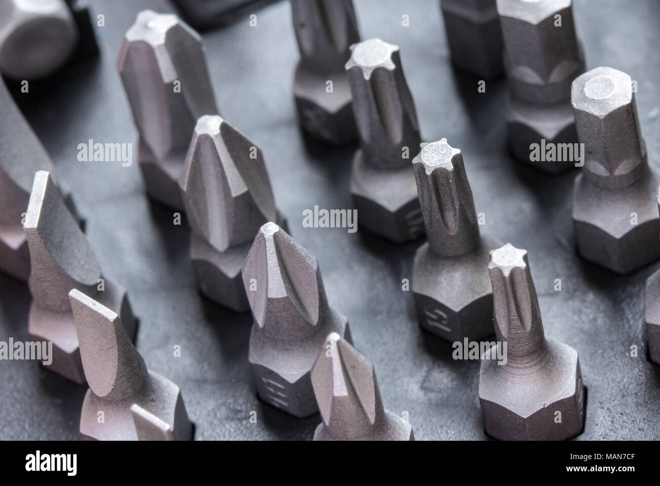 Set of bits for the screws. Selection of different shapes and bits for ...