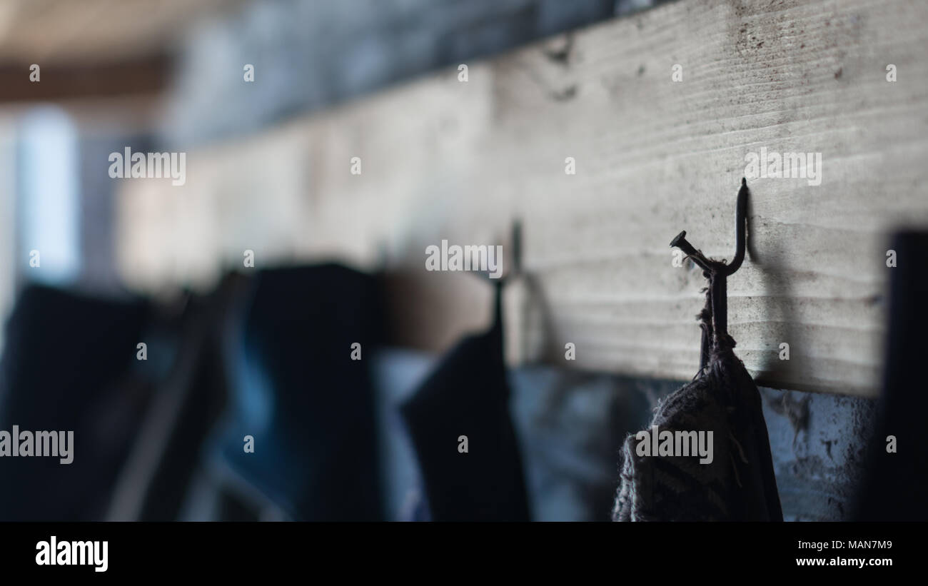 Farmer's house old nail wall hook rack, coat hanger Stock Photo - Alamy