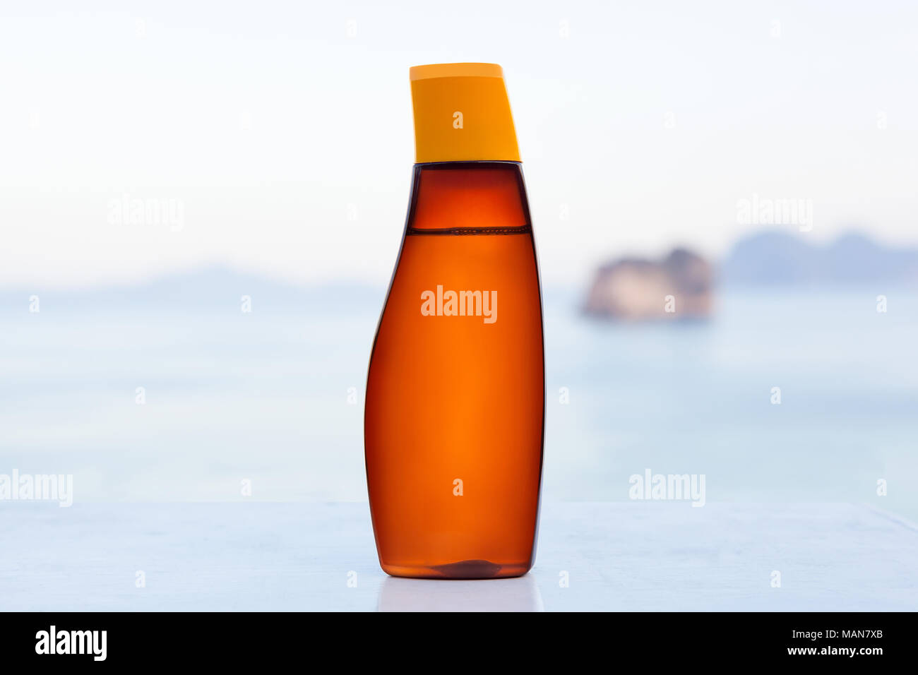 Sunscreen in luxurious bottle outdoors on beach in summer. Sun ...