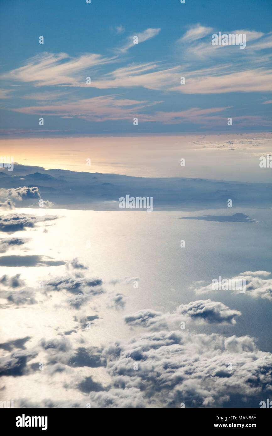 A view of the earth with clouds and the surface of the stratosphere ...