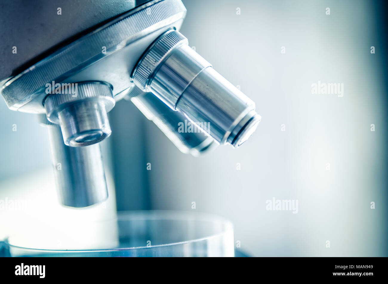 Close-up shot of microscope with metal lens at laboratory. Scientific ...