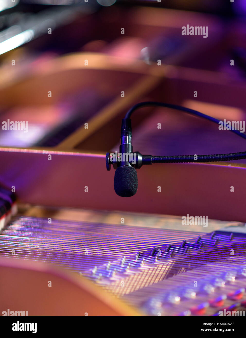 A grand piano on a performance stage Stock Photo - Alamy