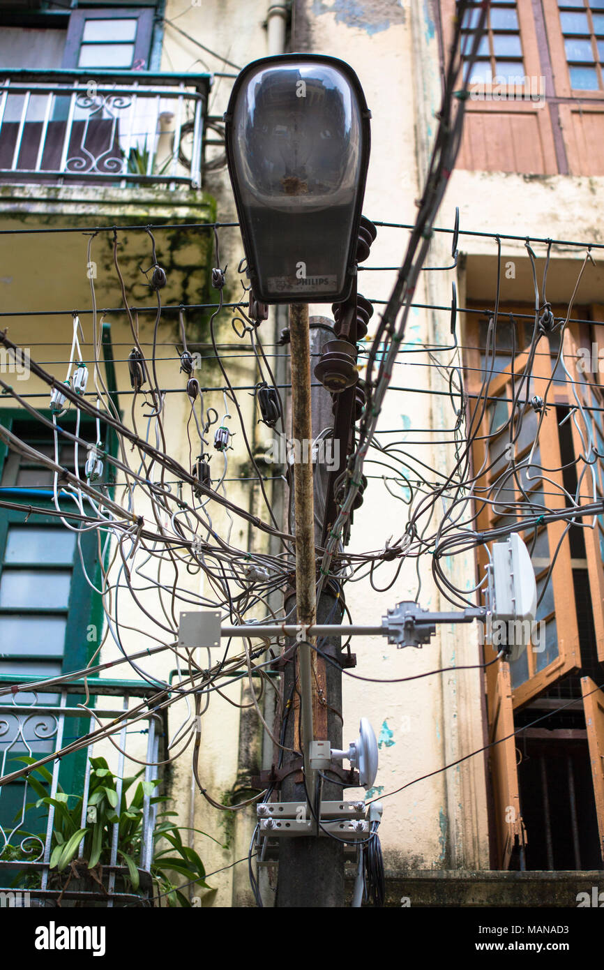 Haphazard disorganized chaotic power cables running along street ...