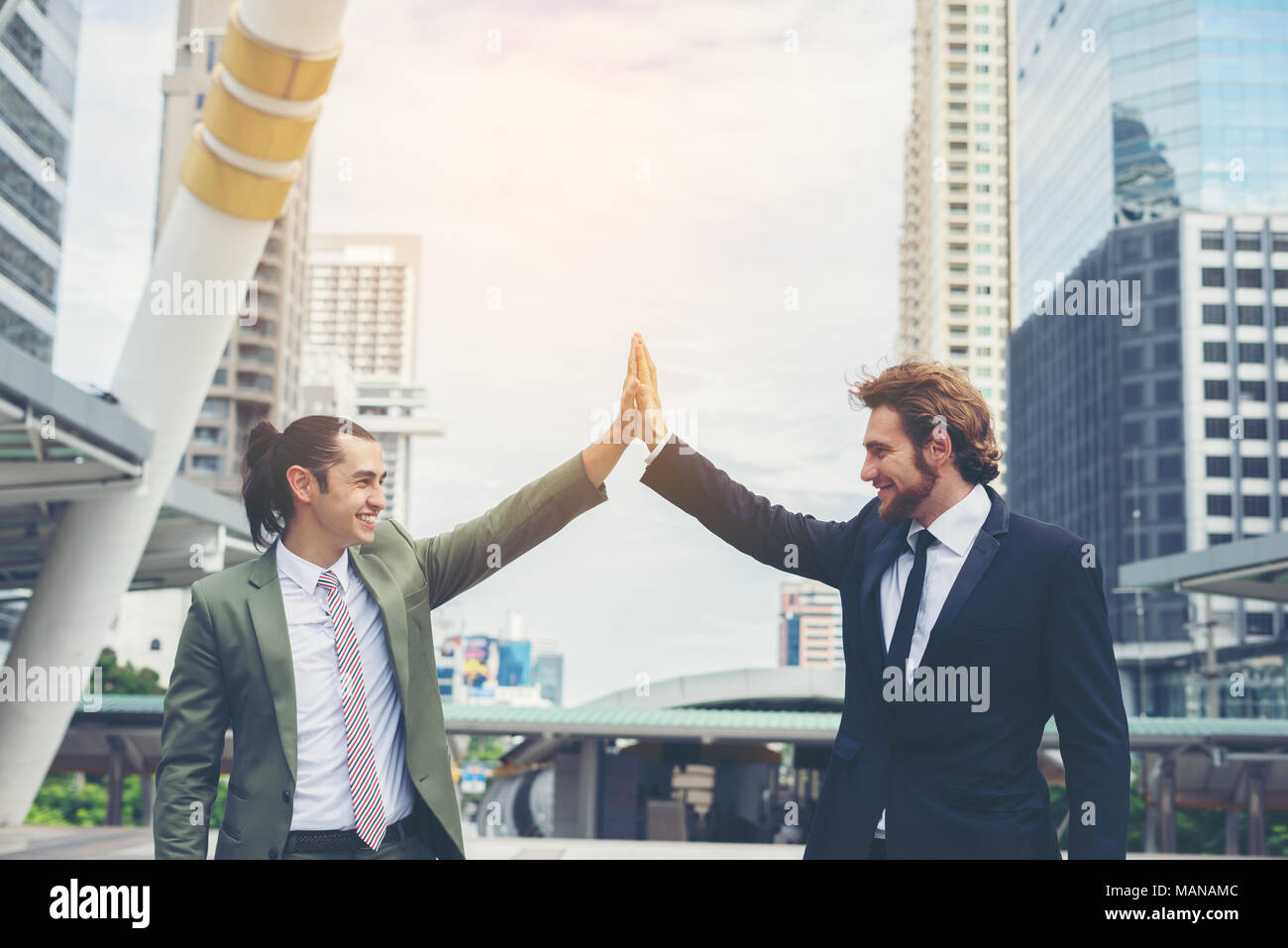 Happy Businessman success with deal together. Business success and goal ...