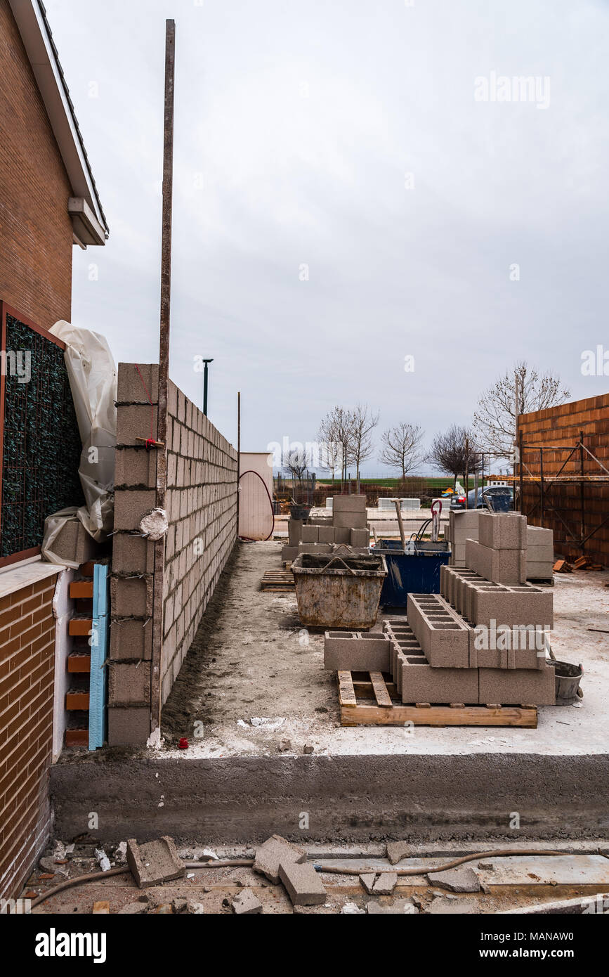 Works of construction of reinforced concrete block wall with insulation ...