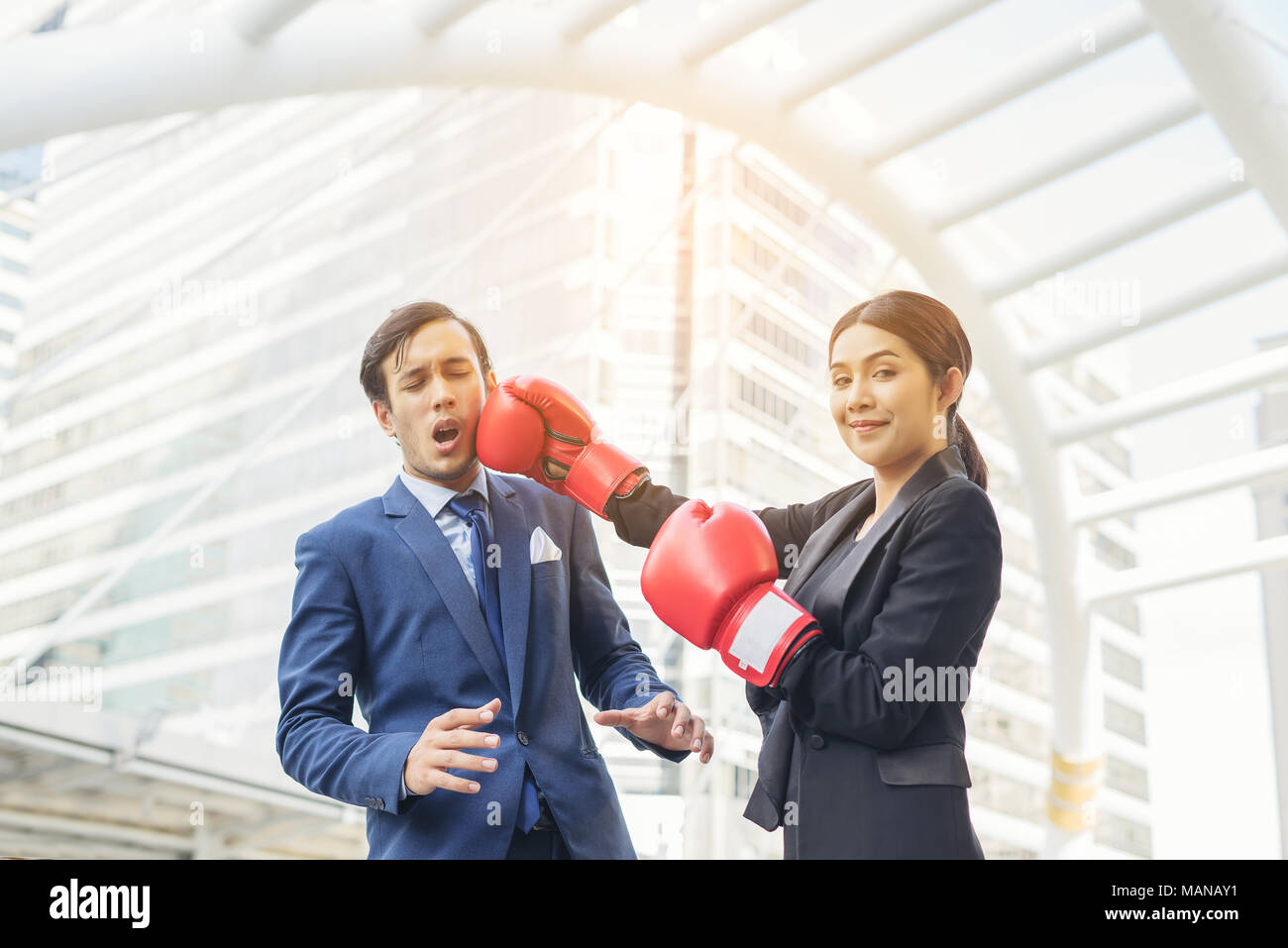 Business woman and man compete with a fight and boxing, Business people ...