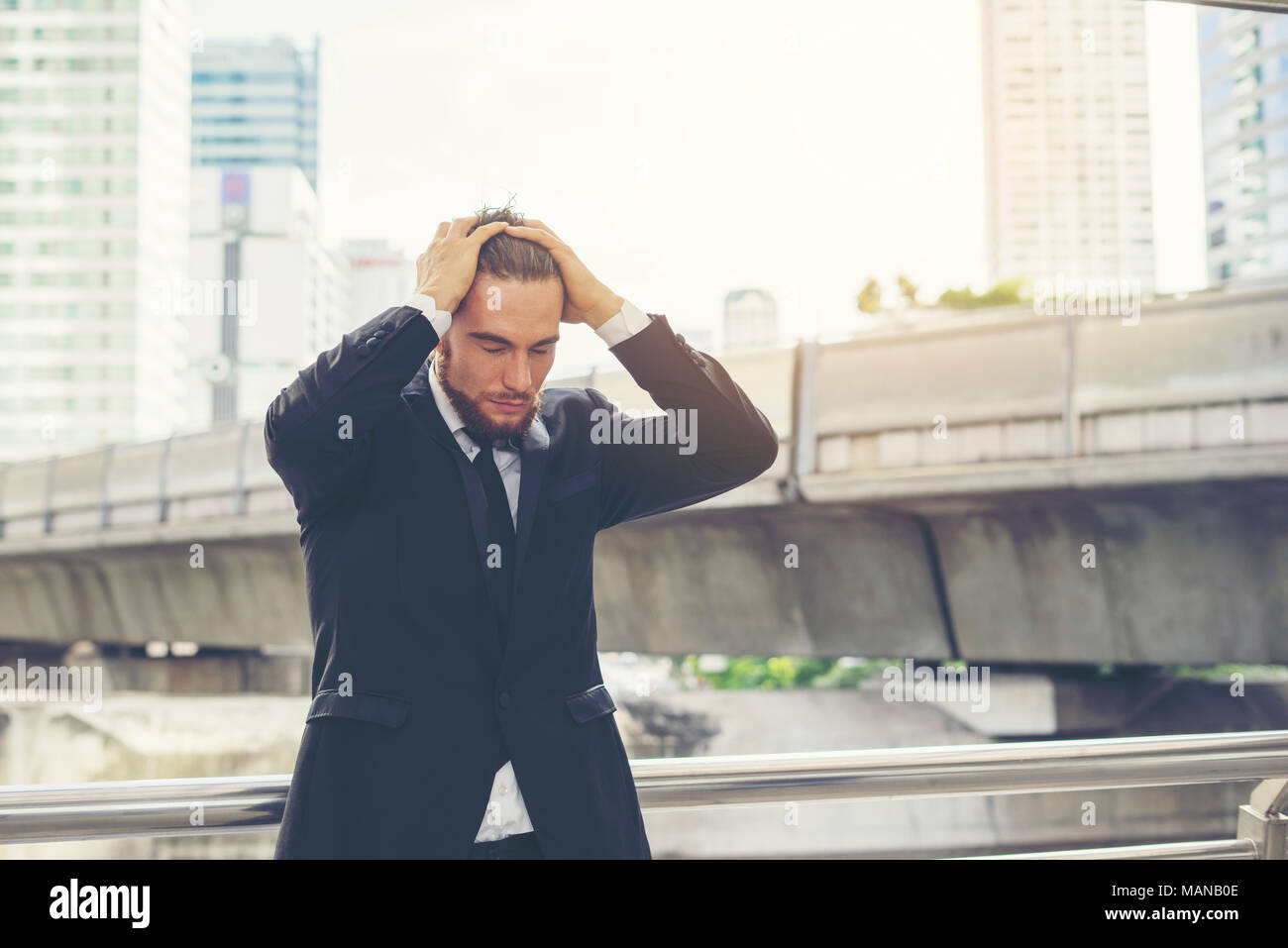 Young businessman hand over on head feel stressed about work Stock ...