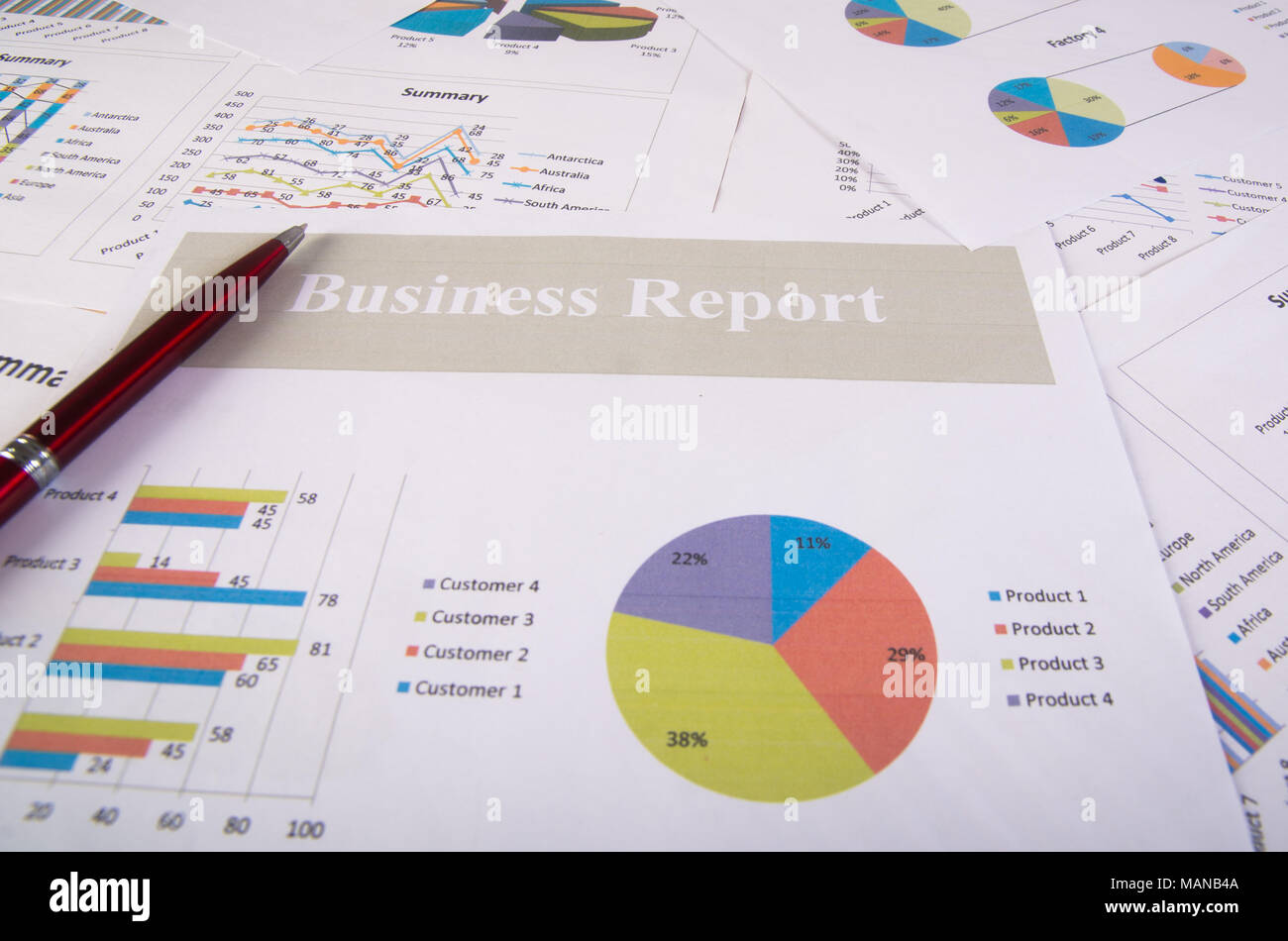 Business report. Graphs and charts. Business reports and pile of ...