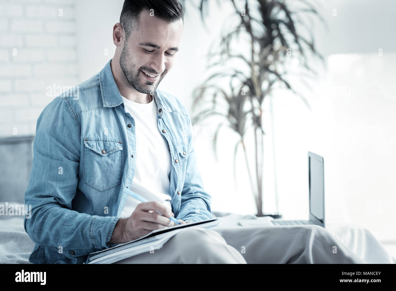 Smart nice man planning his day Stock Photo - Alamy