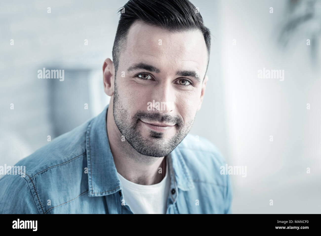 Portrait of a positive handsome man Stock Photo - Alamy