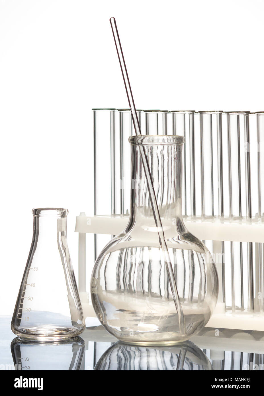Laboratory glassware on white background Stock Photo - Alamy