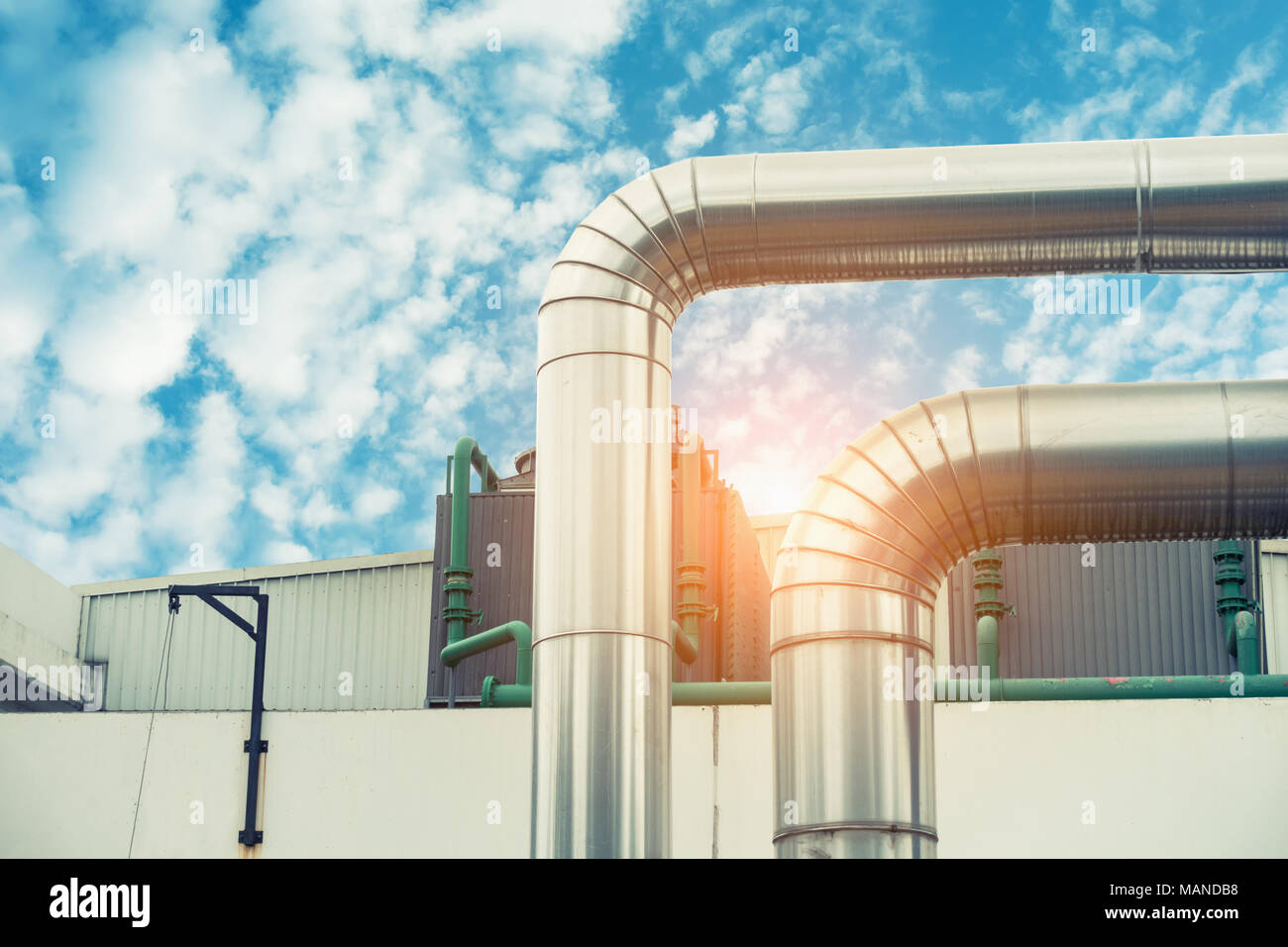 Steam insulation pipeline at corner Stock Photo - Alamy