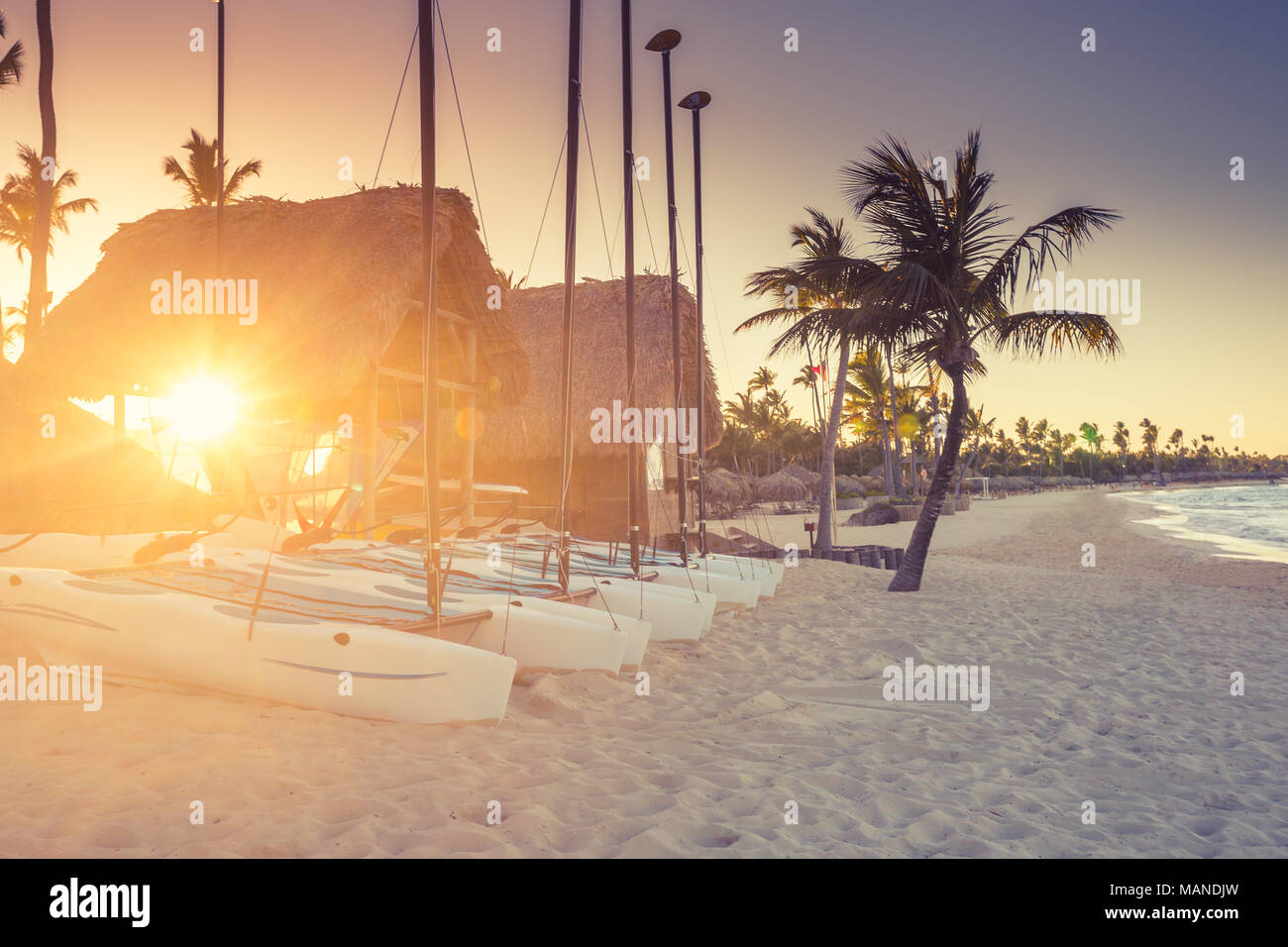 Sunset on the beach of Caribbean sea, Dominican Republic Stock Photo ...