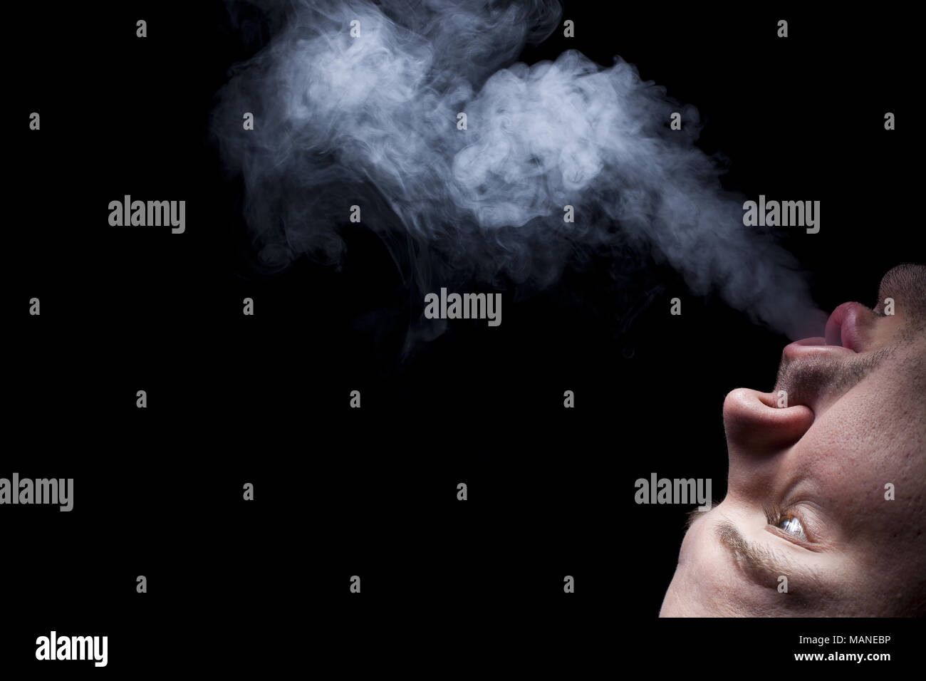 Man exhales hi-res stock photography and images - Alamy