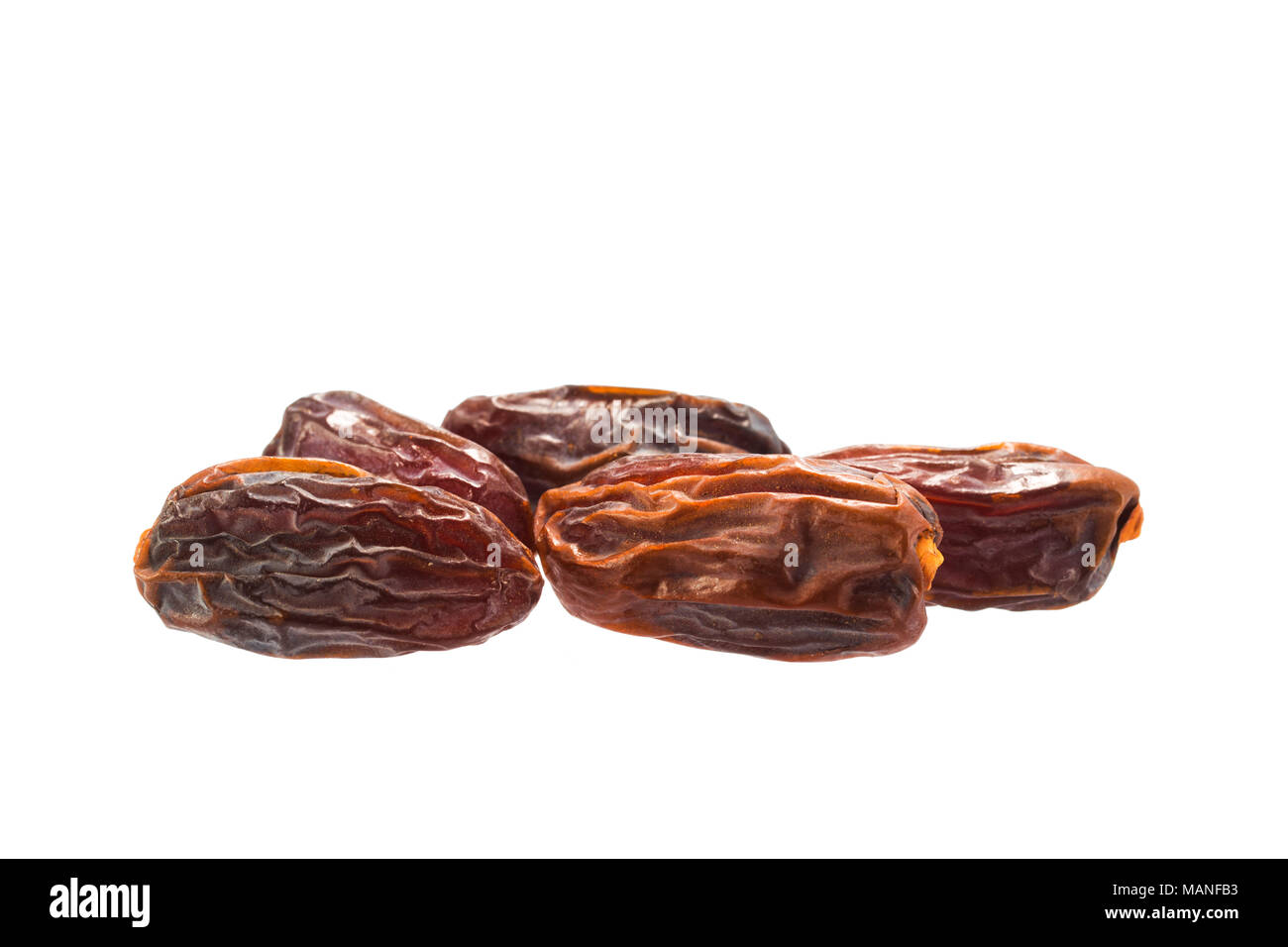 Dried delicious dates isolated on a white background Stock Photo - Alamy