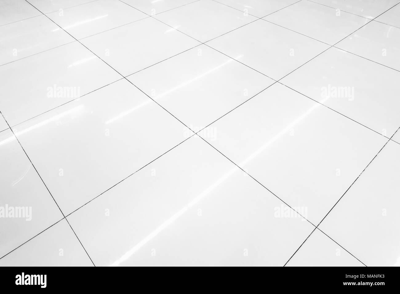 Flooring tile background and reflection of luminaire Stock Photo - Alamy