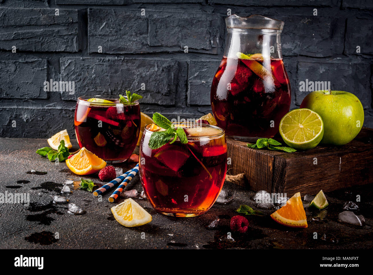 Summer cold cocktail, fruit and berry red wine sangria with apple ...