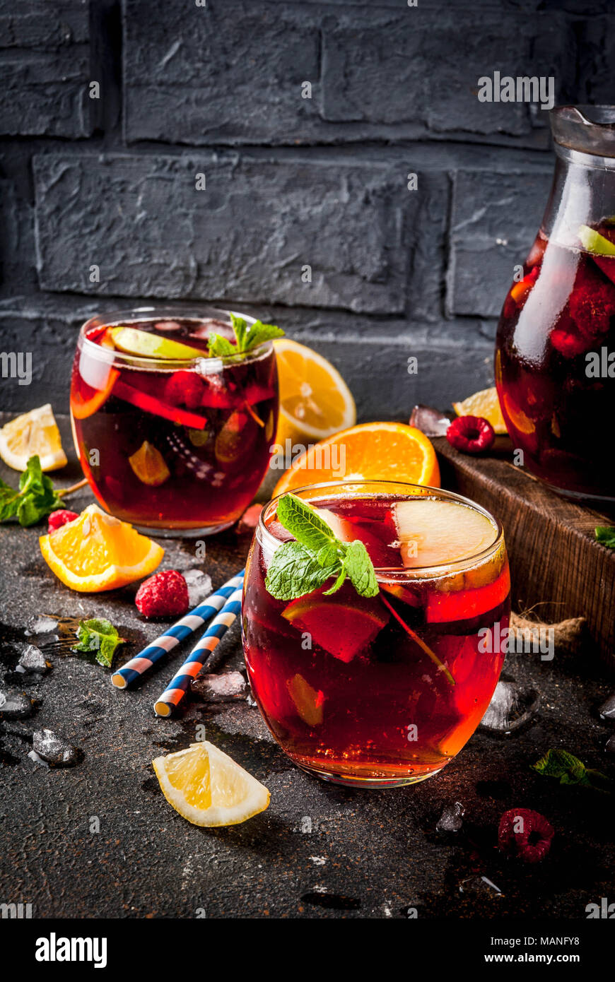 Summer cold cocktail, fruit and berry red wine sangria with apple ...
