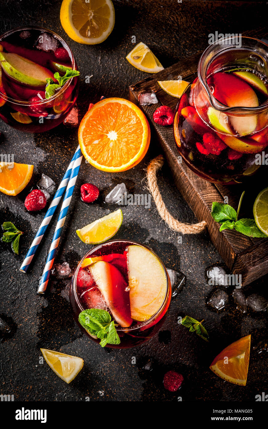 Summer cold cocktail, fruit and berry red wine sangria with apple ...