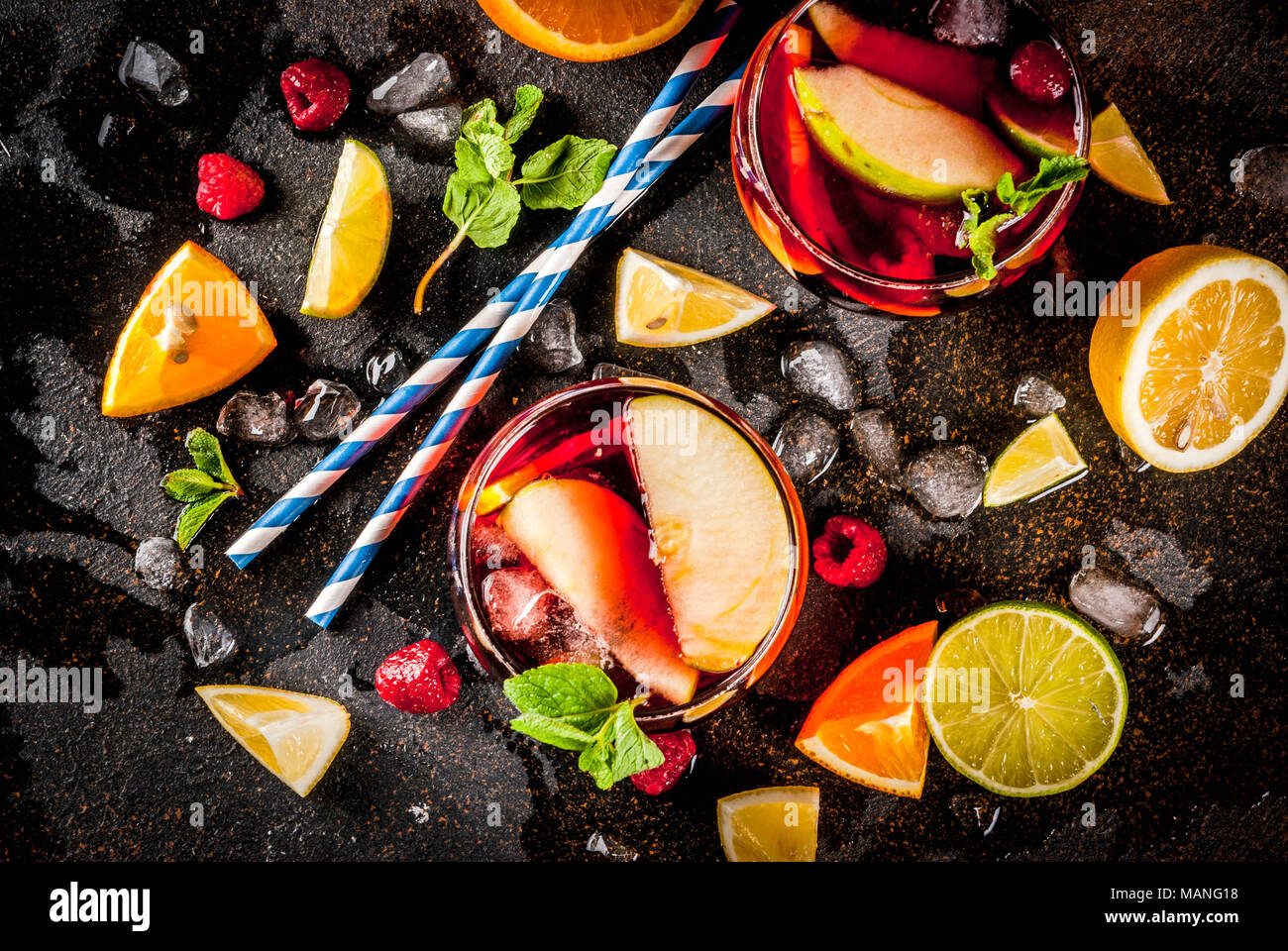Summer cold cocktail, fruit and berry red wine sangria with apple ...