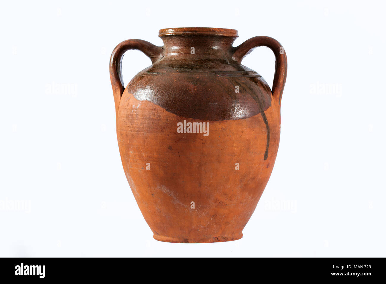 Antique pot isolated on a white background Stock Photo - Alamy