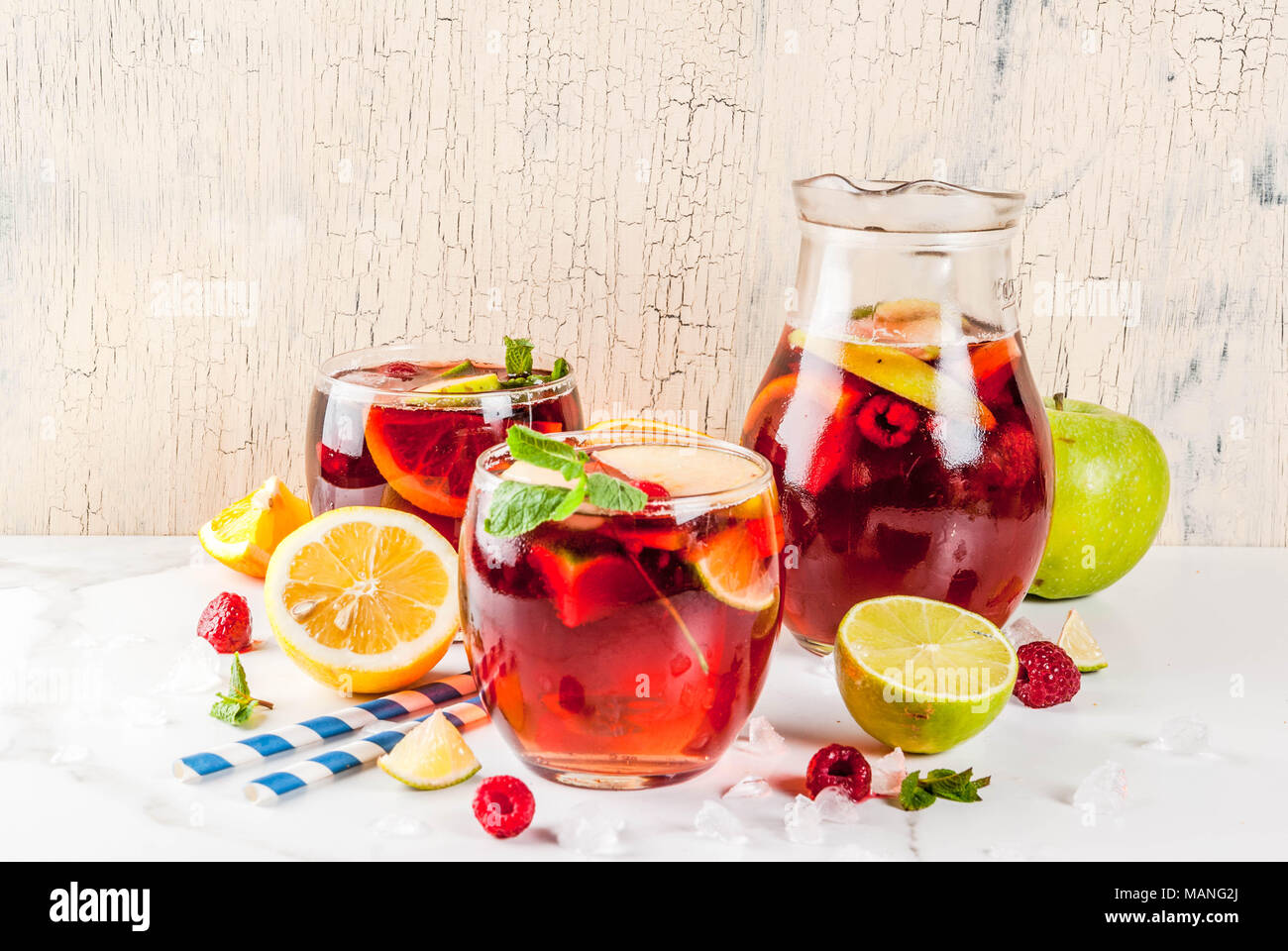 Summer cold cocktail, fruit and berry red wine sangria with apple ...