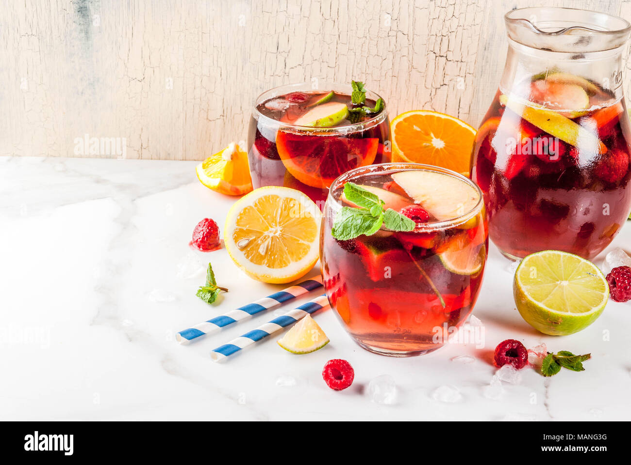 Summer cold cocktail, fruit and berry red wine sangria with apple ...