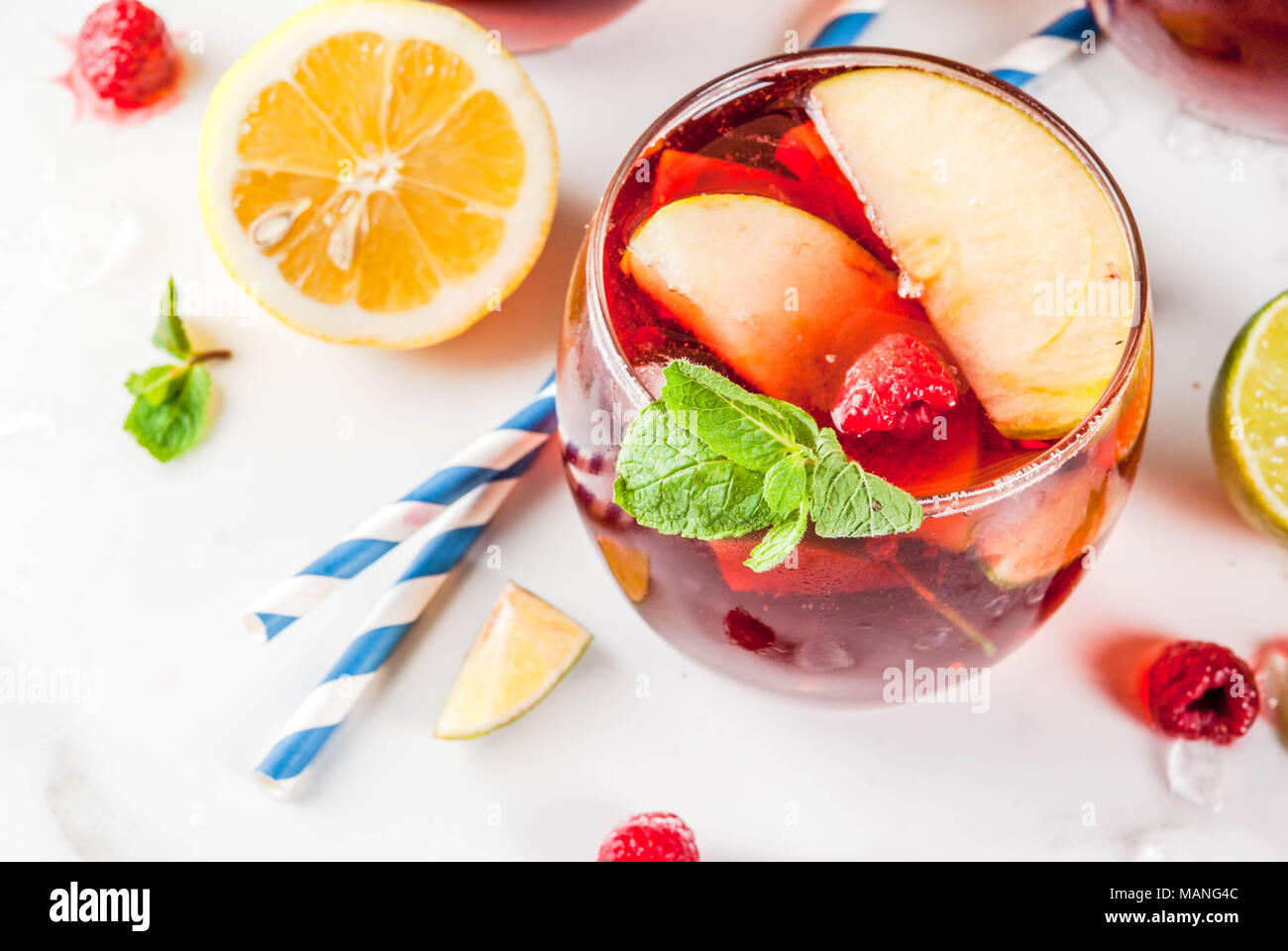 Summer cold cocktail, fruit and berry red wine sangria with apple ...