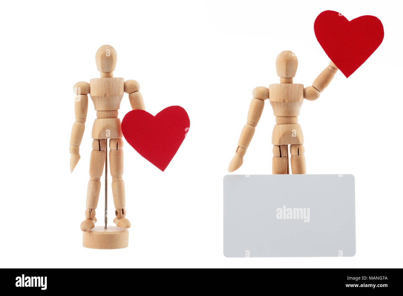 Wooden man toy statue with heart and blank card for text studio ...