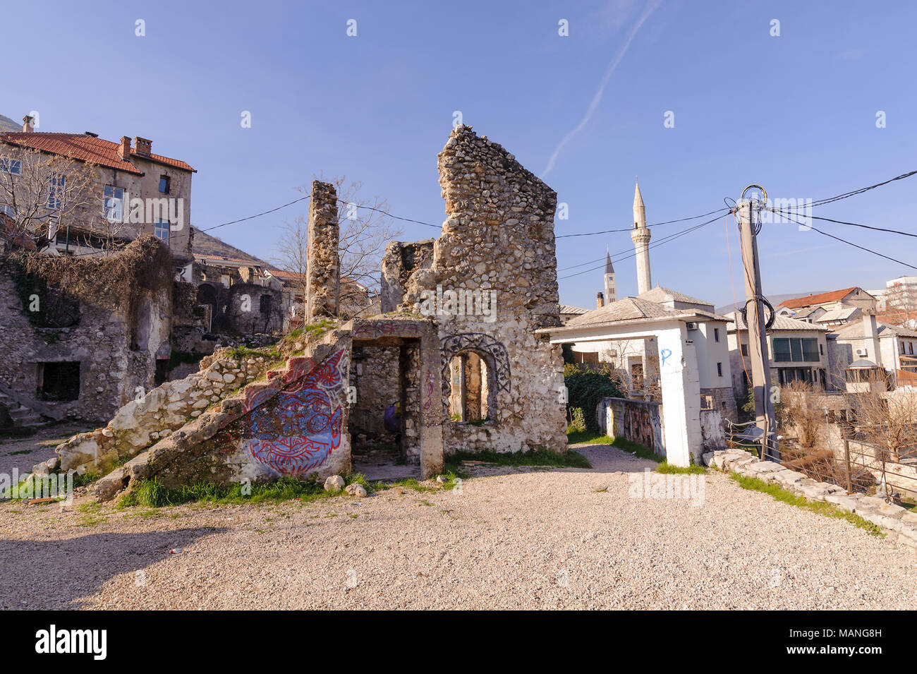 MOSTAR, BOSNIA - JAN 26, 2018: Ruin house with mural painting in the ...