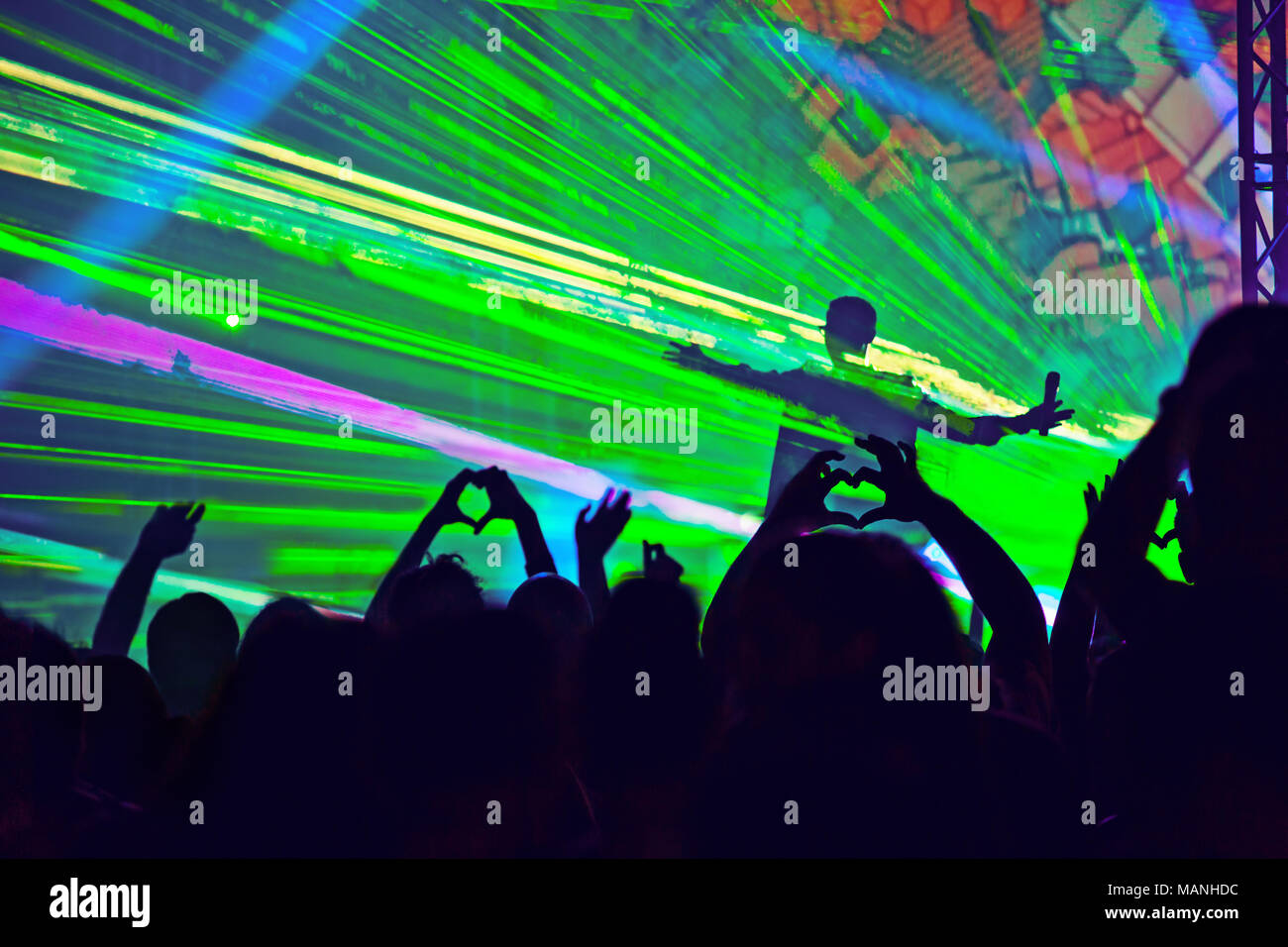 Photo of young people having fun at rock concert Stock Photo - Alamy