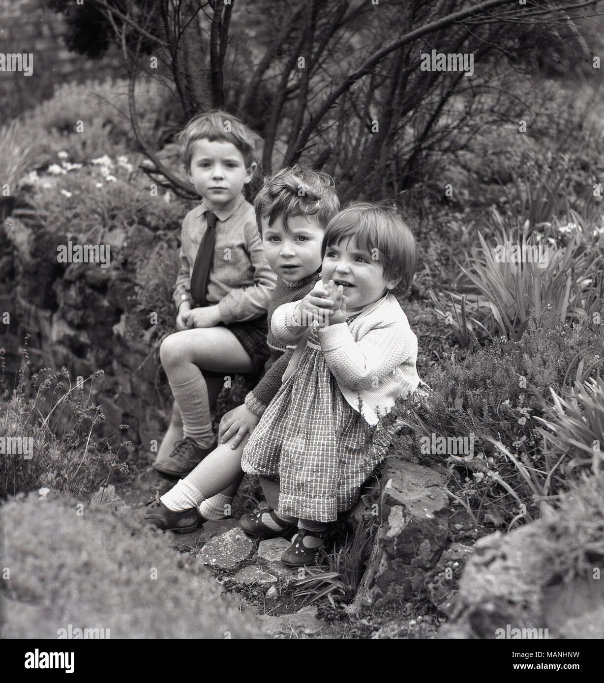 Children playing outside 1960s hi-res stock photography and images - Alamy