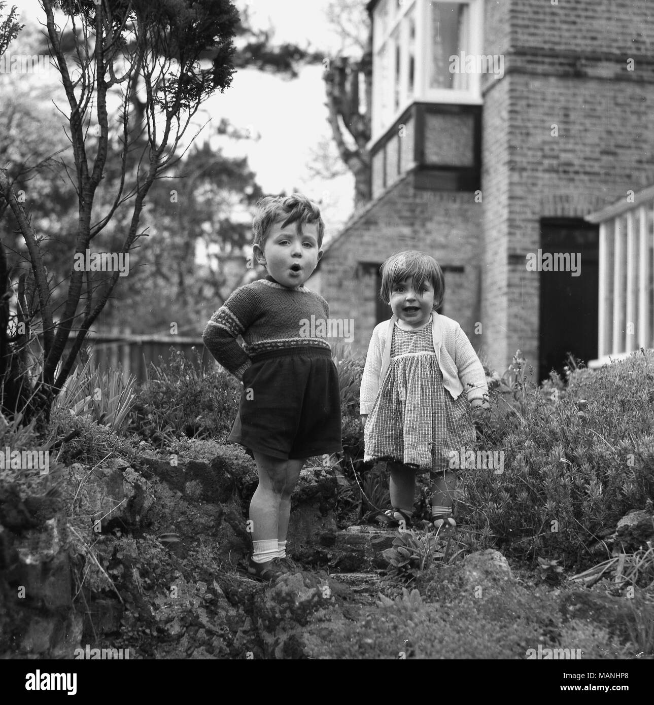 Children playing outside 1960s hi-res stock photography and images - Alamy