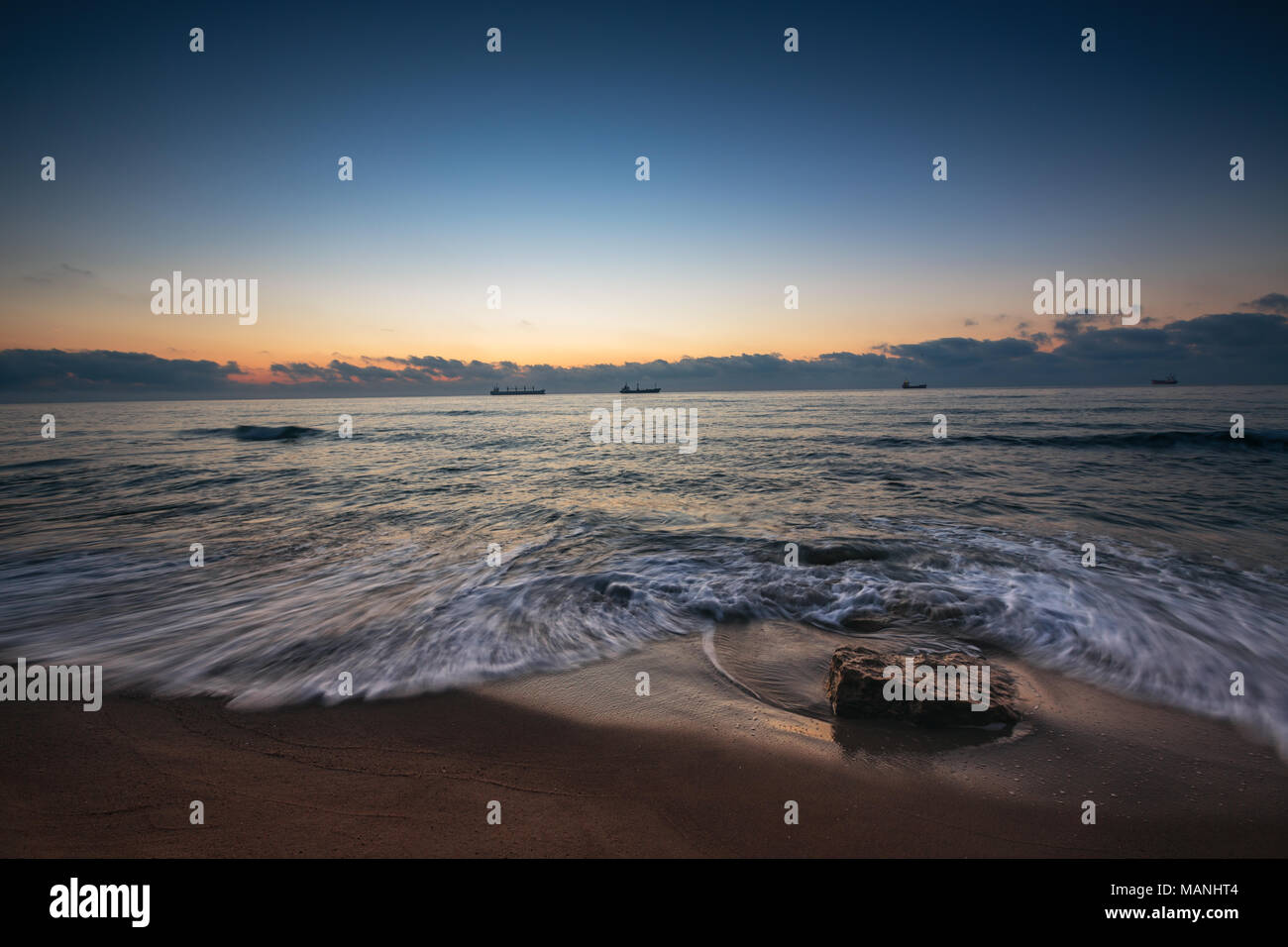 Cargo ships in the sunlight hi-res stock photography and images - Alamy