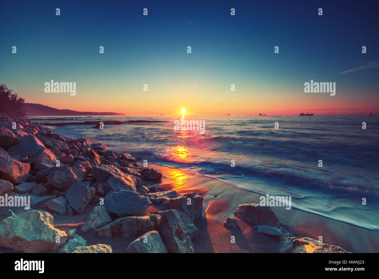 Beautiful sunrise over the horizon Stock Photo - Alamy