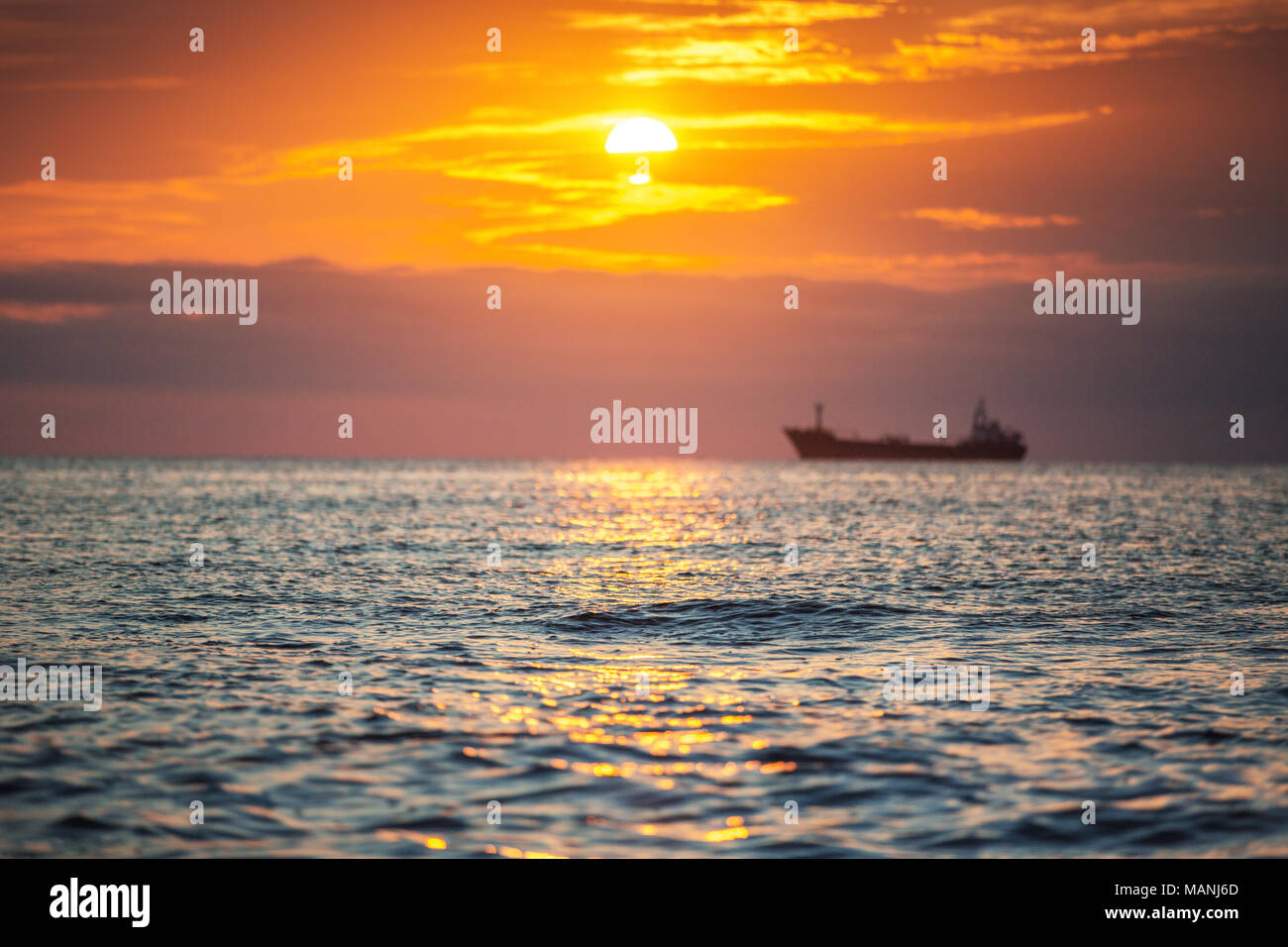 Morning sunrise over sea Stock Photo - Alamy