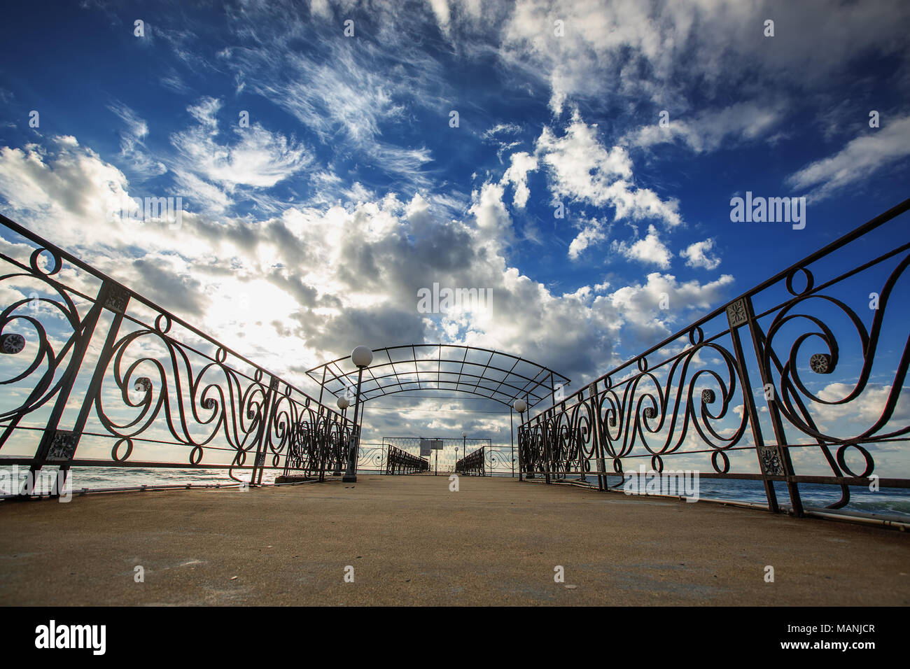 Stone pier into the sea.Sunrise shot Stock Photo - Alamy