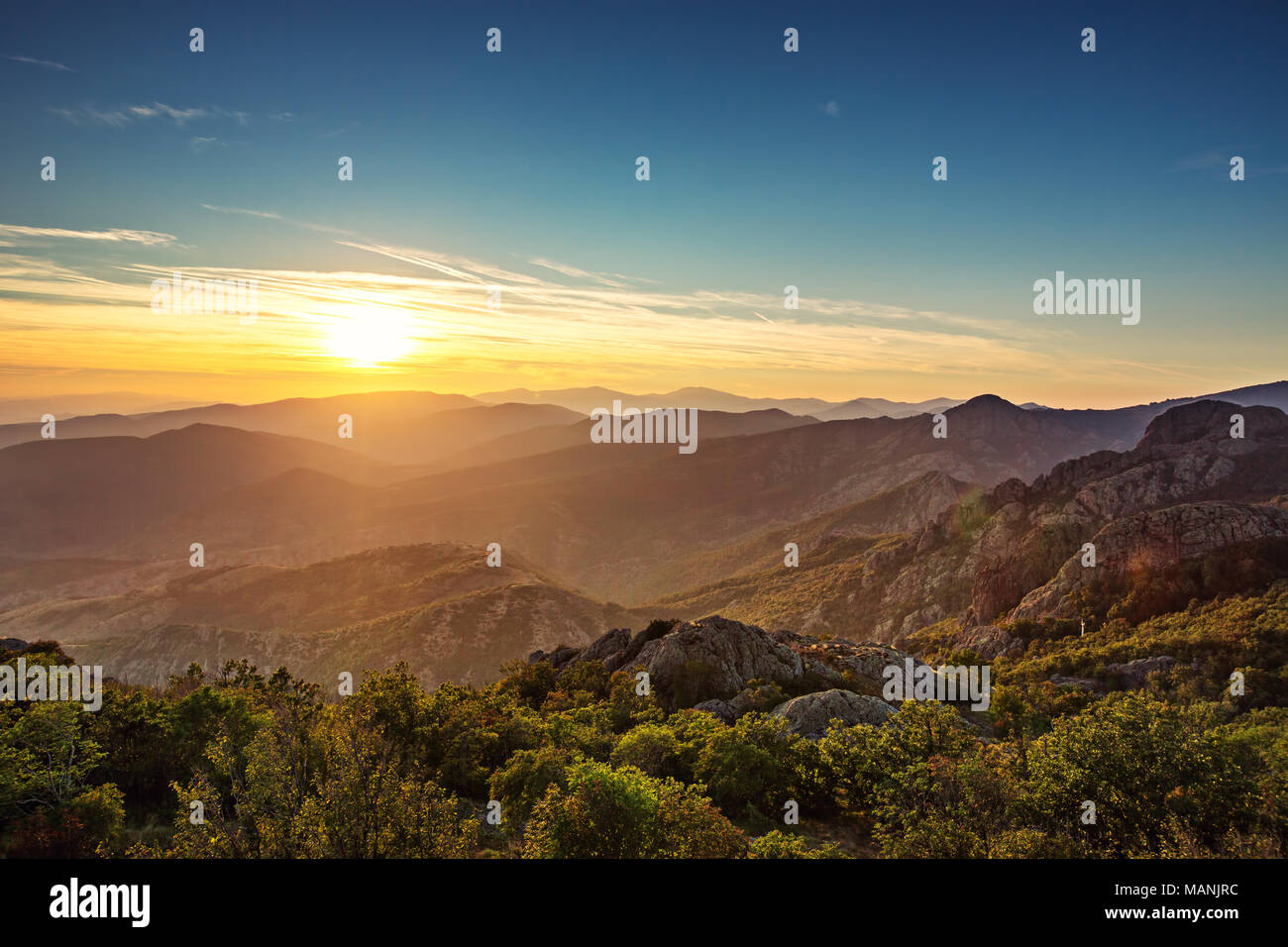 Colorful sunset in the mountain Stock Photo - Alamy
