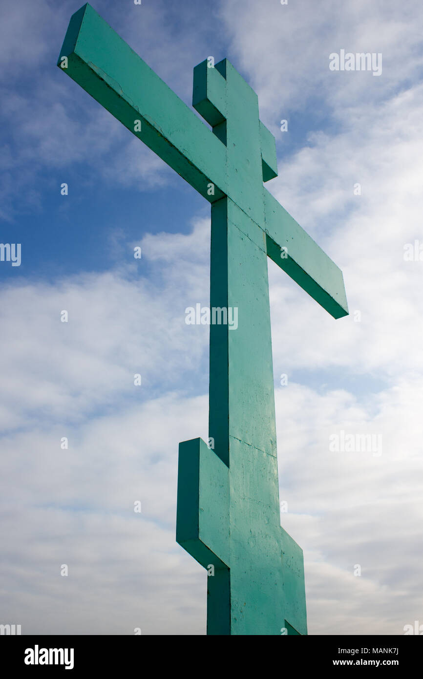 Green Orthodox cross on a background of blue sky Stock Photo - Alamy