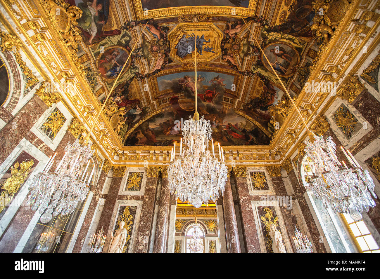 A luxury ceiling decoration in Versailles palace in Paris, France Stock ...