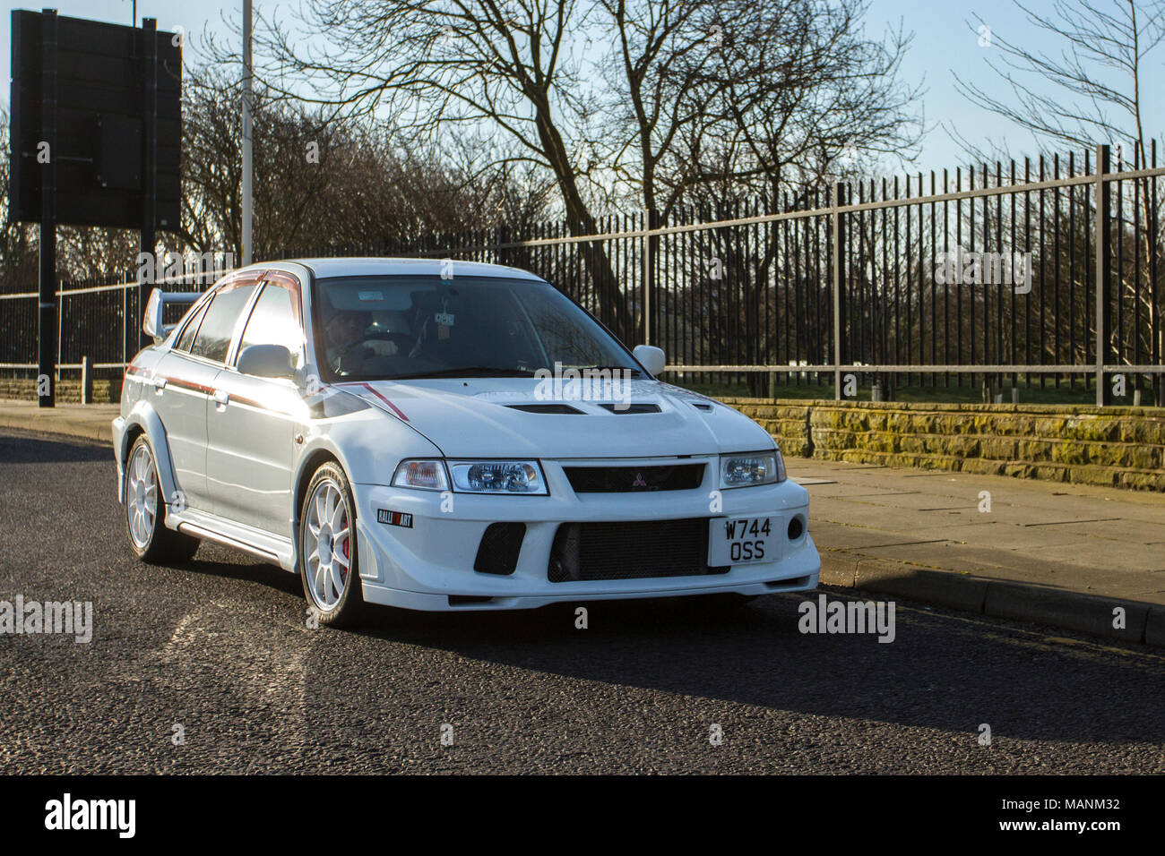 White mitsubishi lancer car hi-res stock photography and images - Alamy