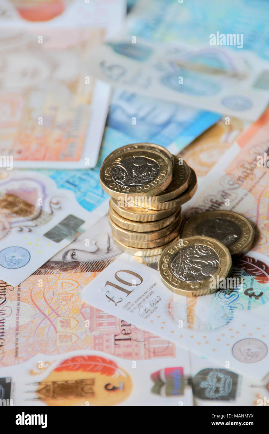 UK Sterling Currency - new notes and coins for 2018. new £1 coins and £ ...