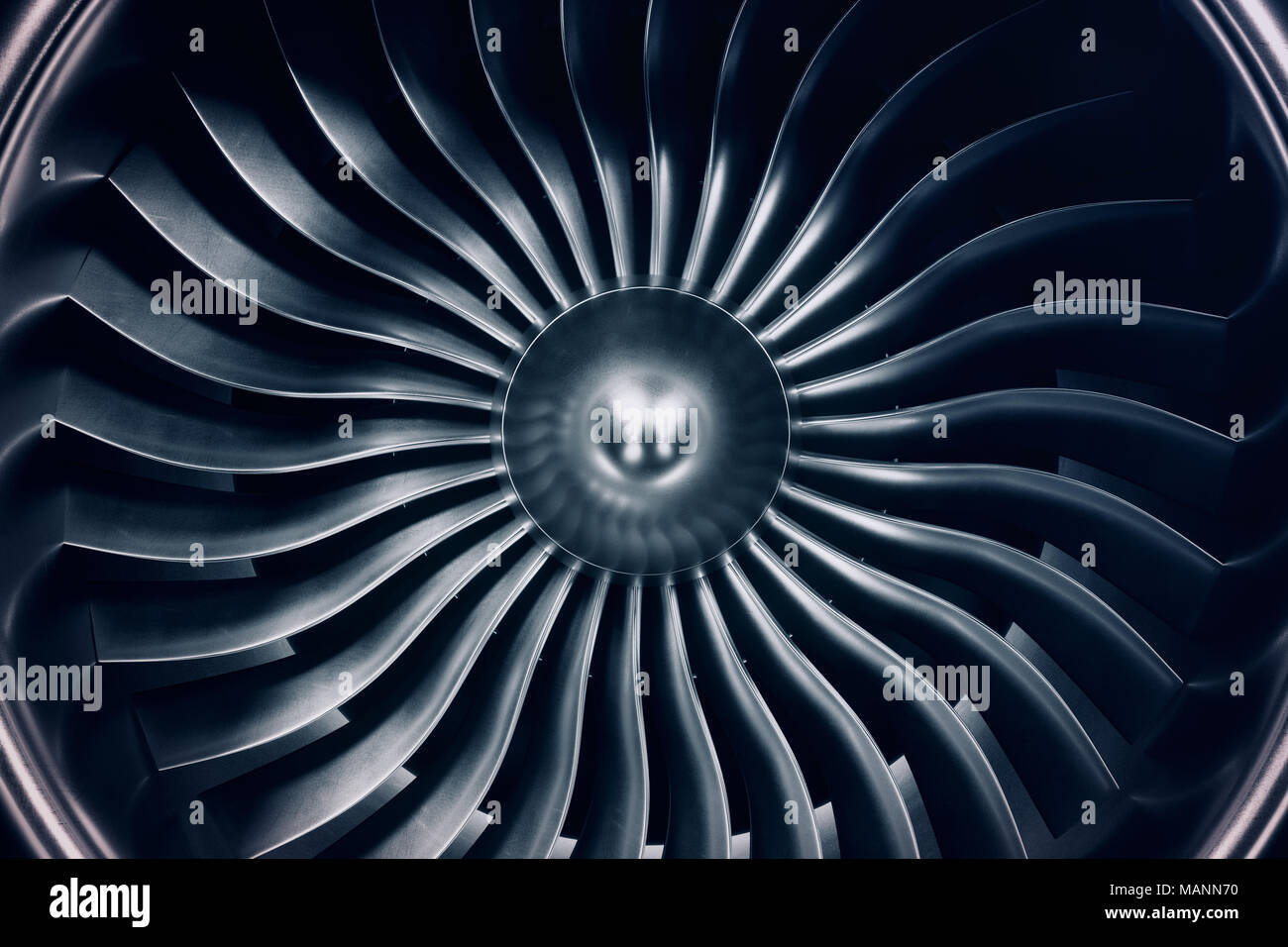 3D Rendering jet engine, close-up view jet engine blades. Blue tint ...