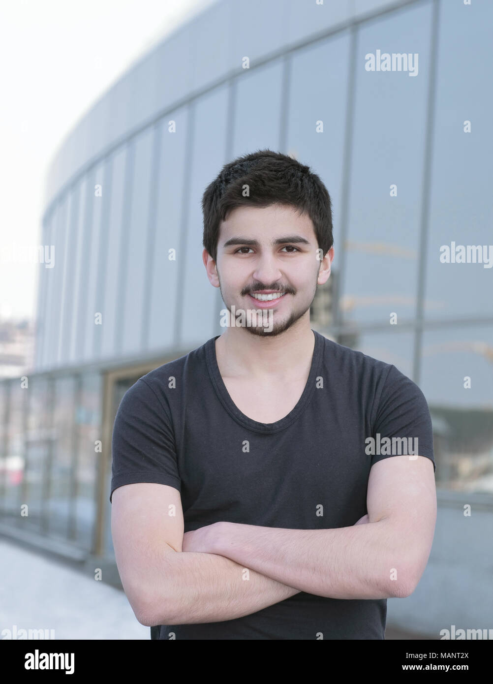 portrait of stylish modern young men in the background of the city ...