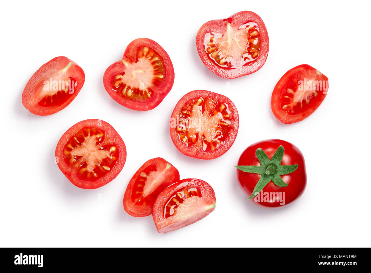 Middle sized globe tomatoes, whole and sliced, top view. Clipping paths ...