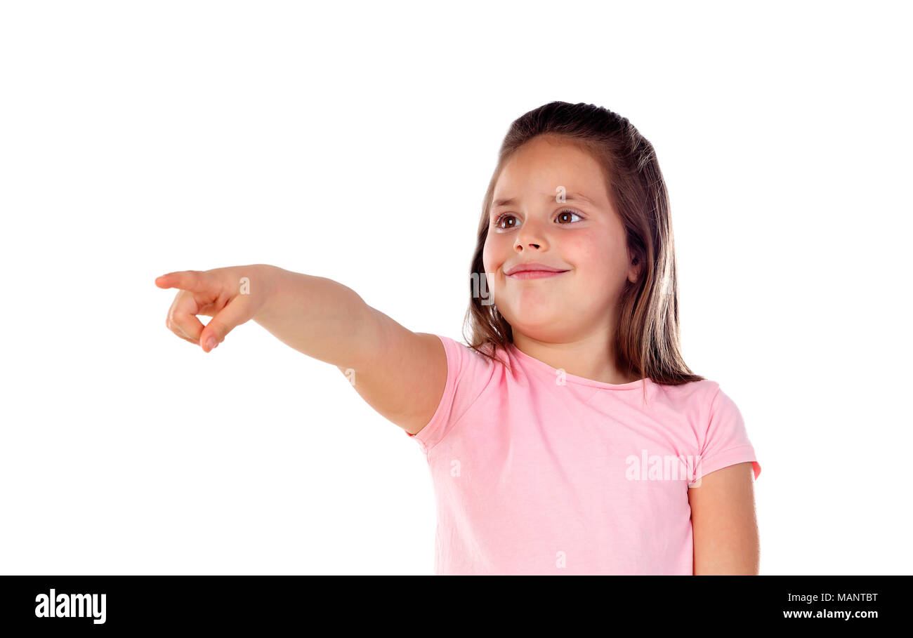 Cute child girl pointing with his finger isolated on white background ...
