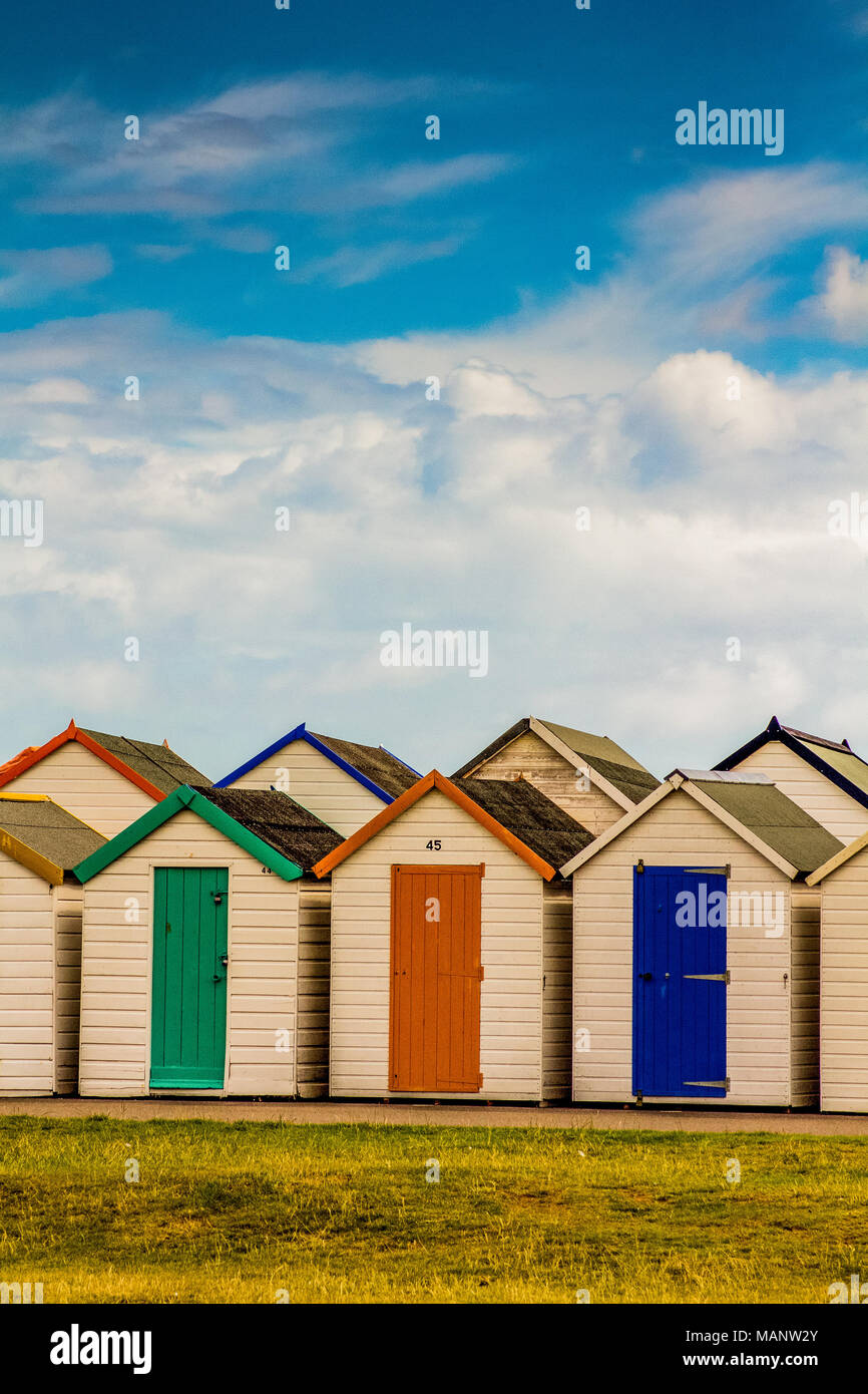 Beautiful Beach huts on the coast Stock Photo - Alamy
