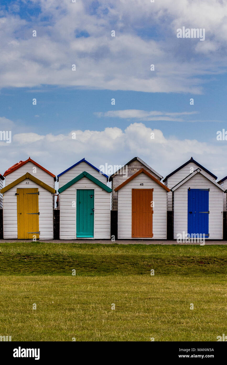 Beautiful Beach huts on the coast Stock Photo - Alamy