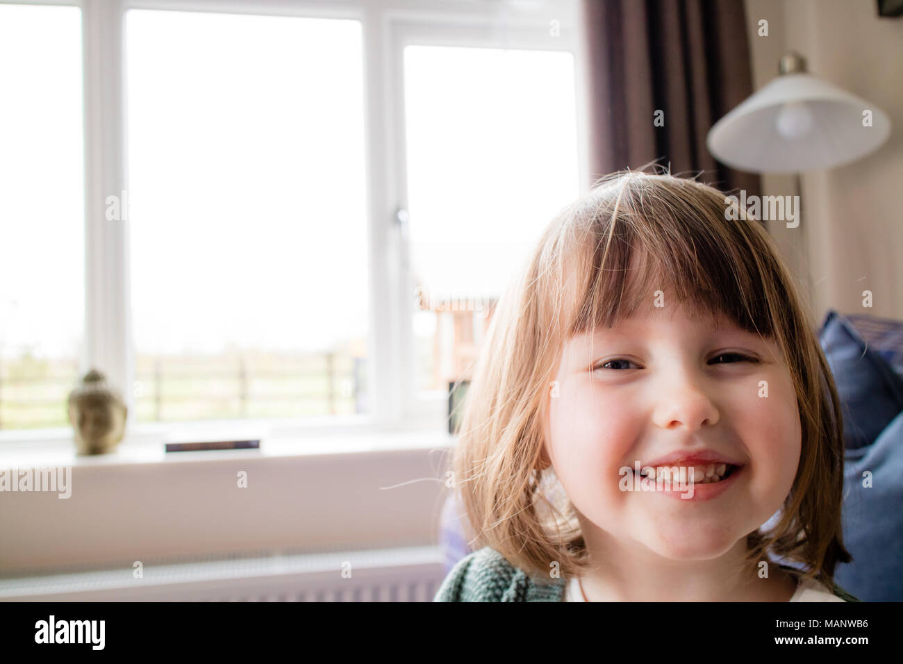 Cheeky grin hi-res stock photography and images - Alamy